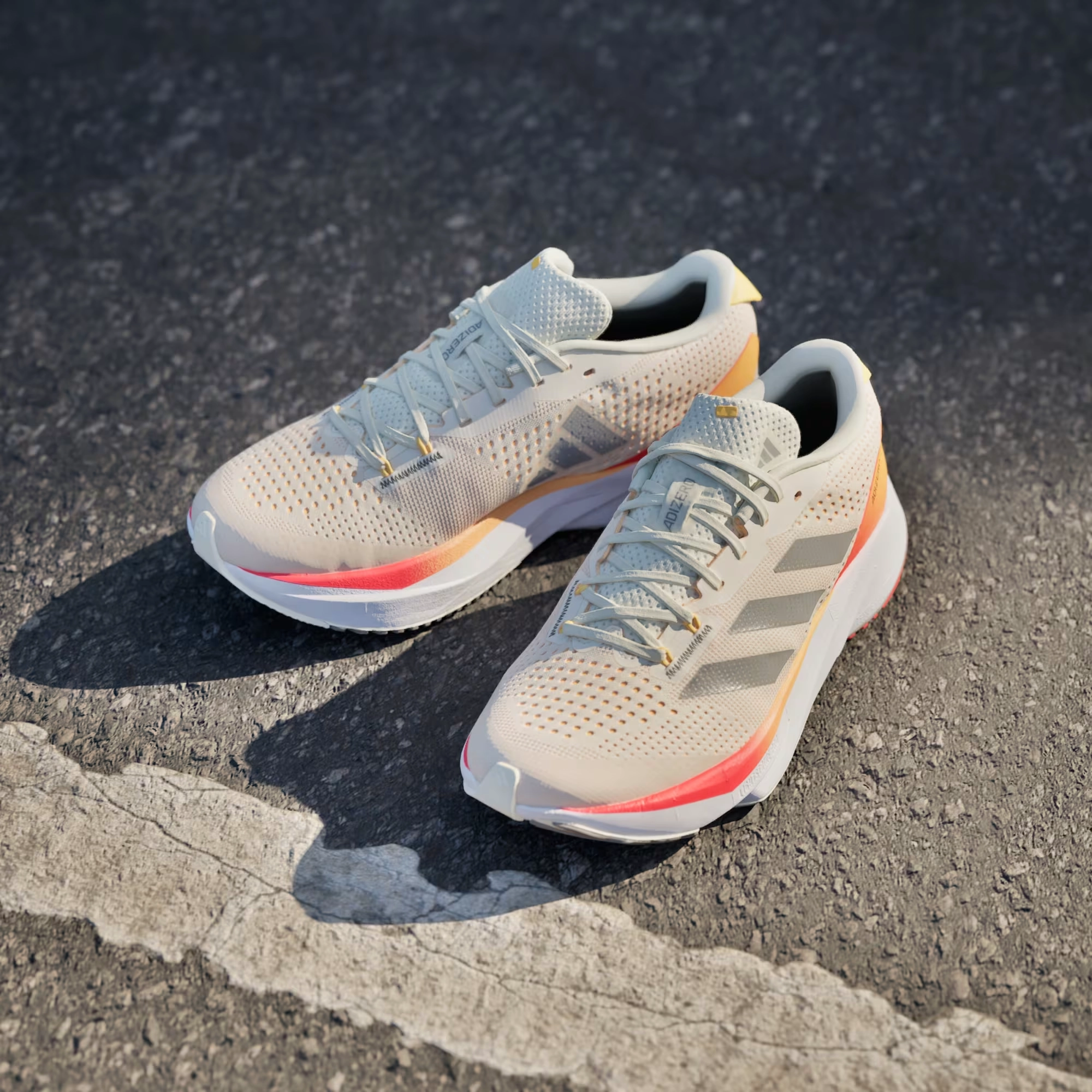 아디다스 아디제로 SL W 아이보리 아이언 메탈릭 스파크 IG3341 | ADIDAS - 슈프라이즈